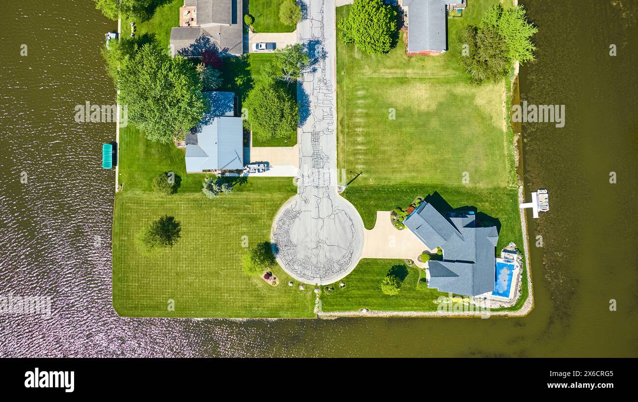Aerial Top Down View of Lakeside Homes with Intricate Driveways in ...