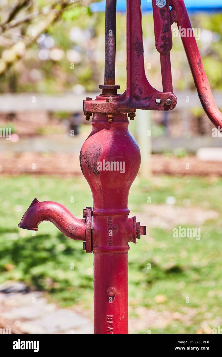 Vintage Red Water Pump in Rustic Setting, Close-Up View Stock Photo - Alamy