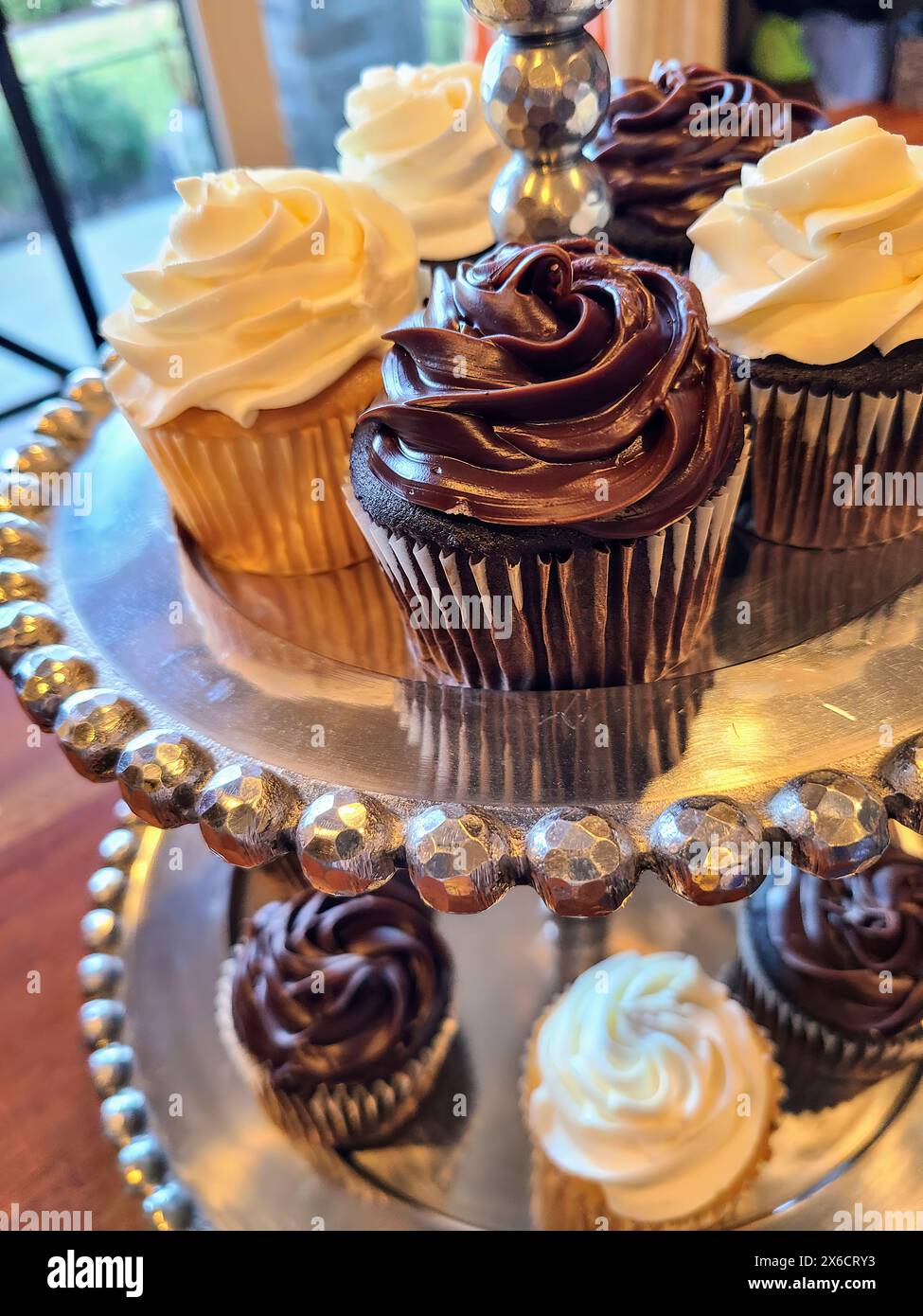 Elegant Cupcakes on Metallic Stand, Eye-Level Perspective Stock Photo ...