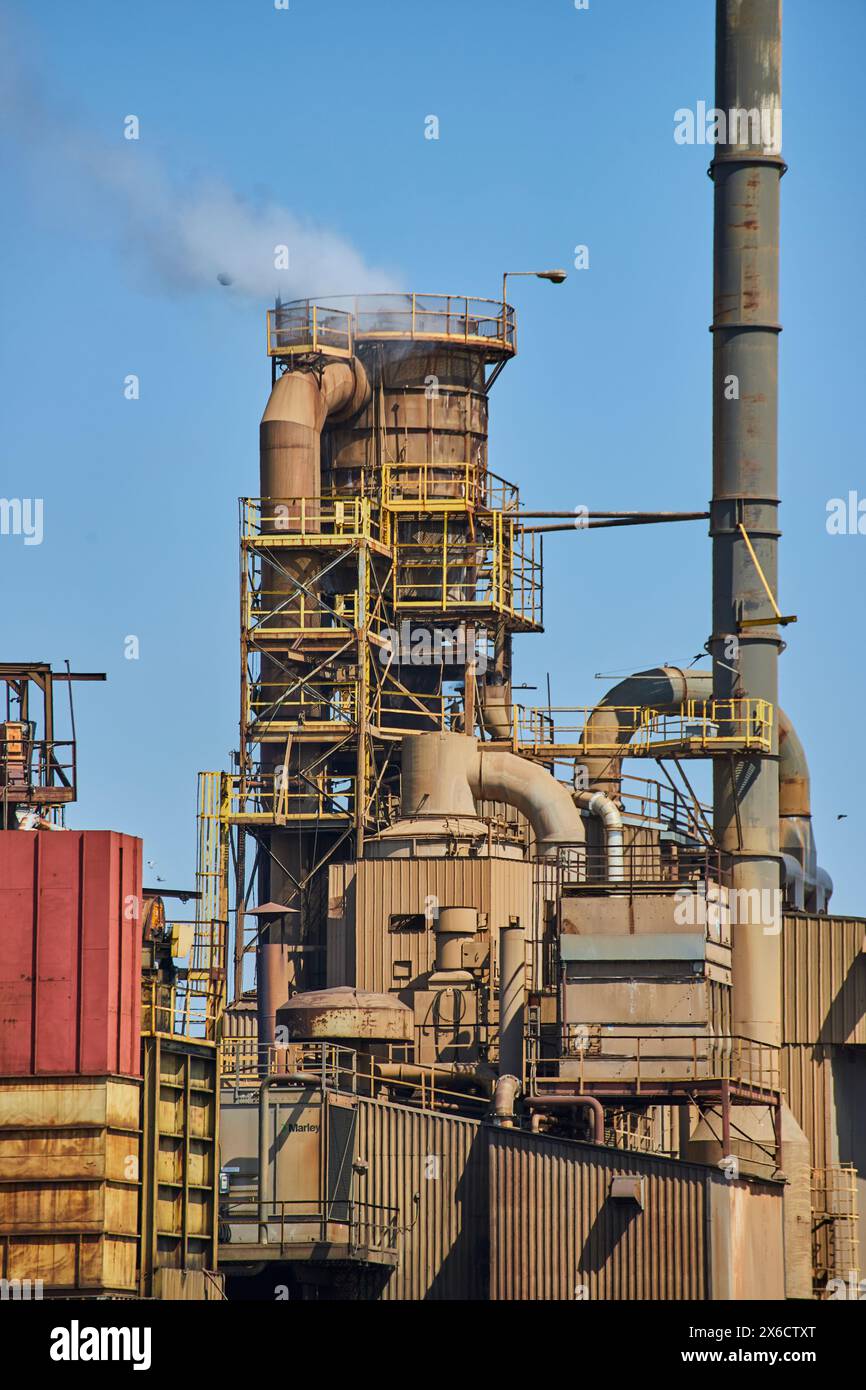 Industrial Facility with Smokestack and Pipes, Clear Sky - Ground Up ...