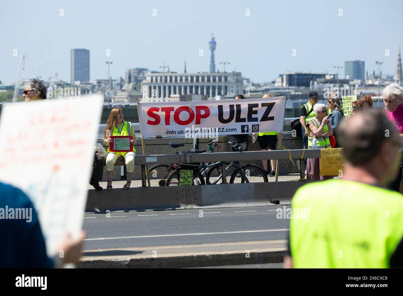 Banners and placards are seen as participants gather for an anti-ULEZ ...