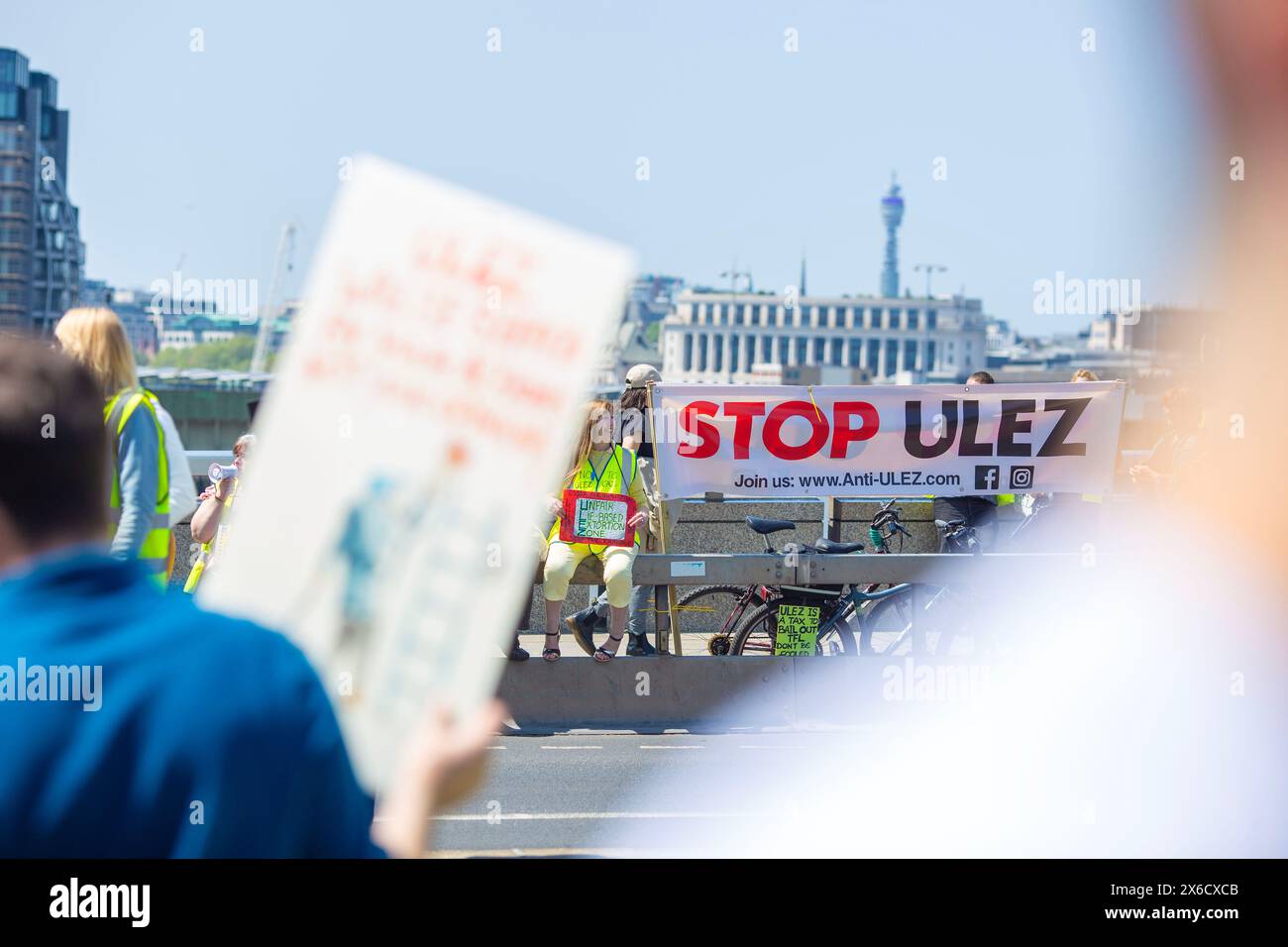 Banners and placards are seen as participants gather for an anti-ULEZ ...