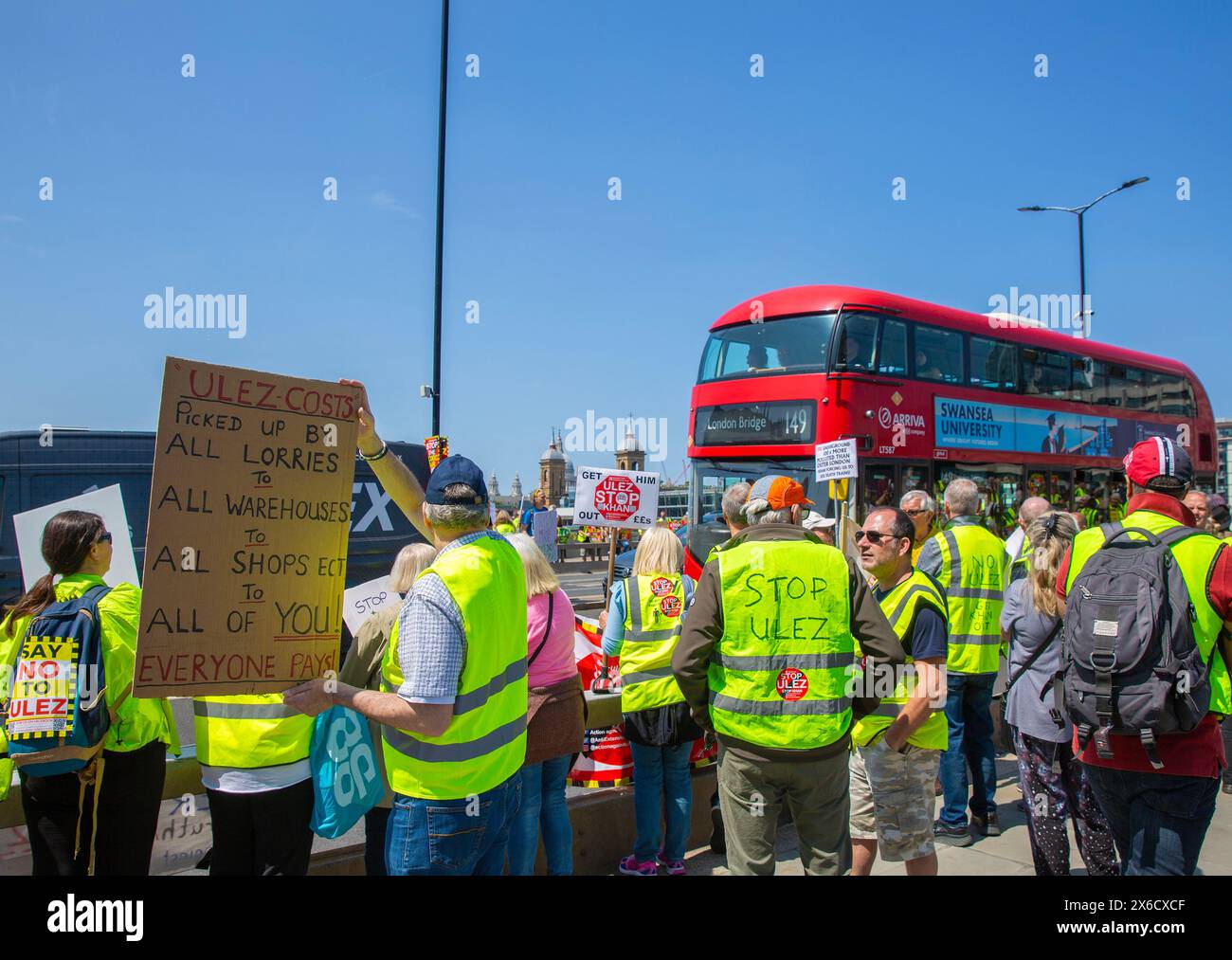 Banners and placards are seen as participants gather for an anti-ULEZ ...