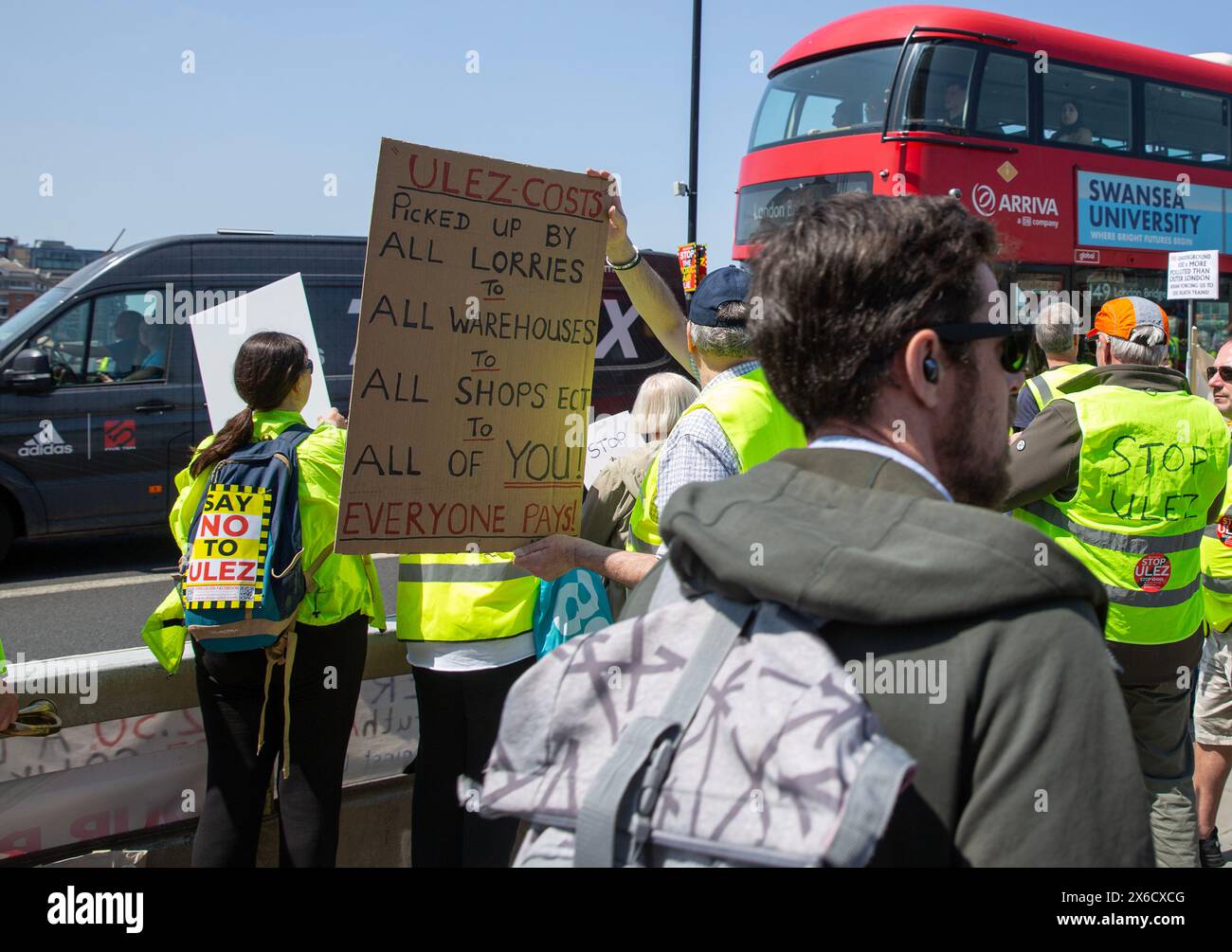 Banners and placards are seen as participants gather for an anti-ULEZ ...