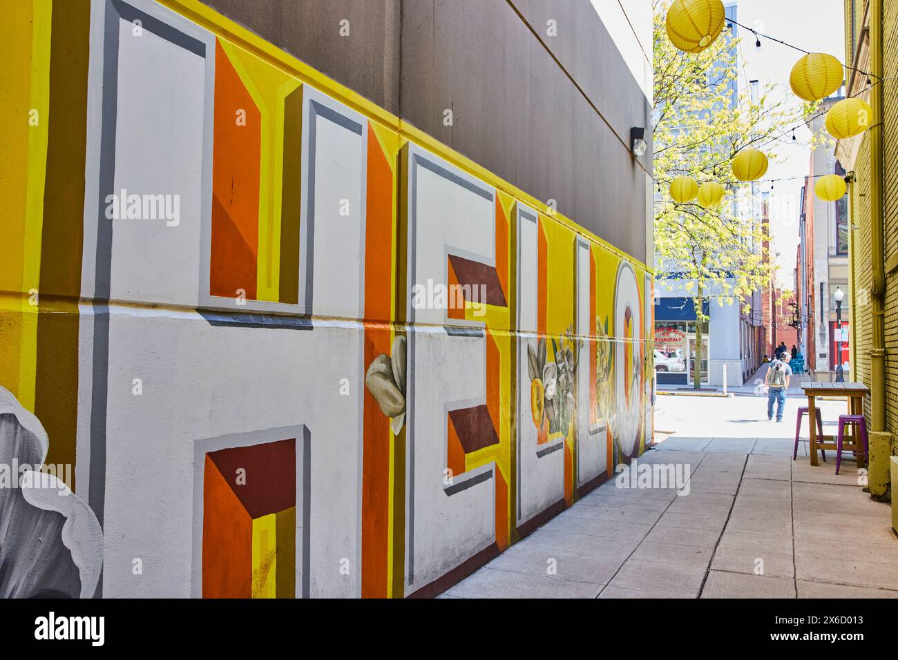 Colorful HELLO Urban Mural and Yellow Lanterns in Alleyway, Eye-Level ...