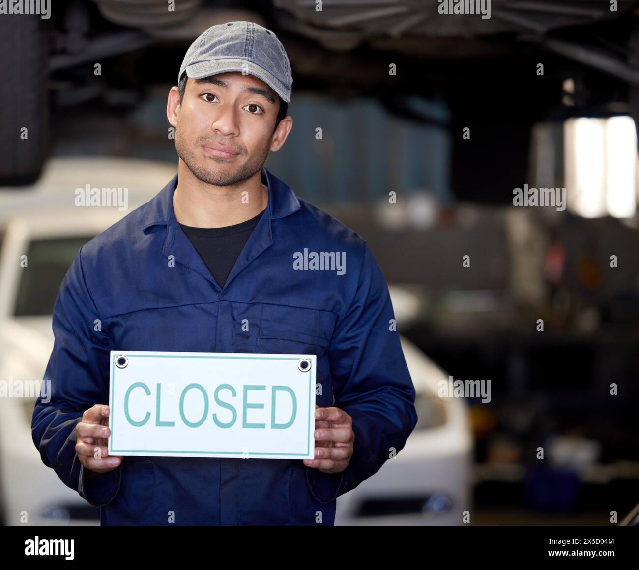 Closed sign, bankrupt and portrait of mechanic man in garage for car ...