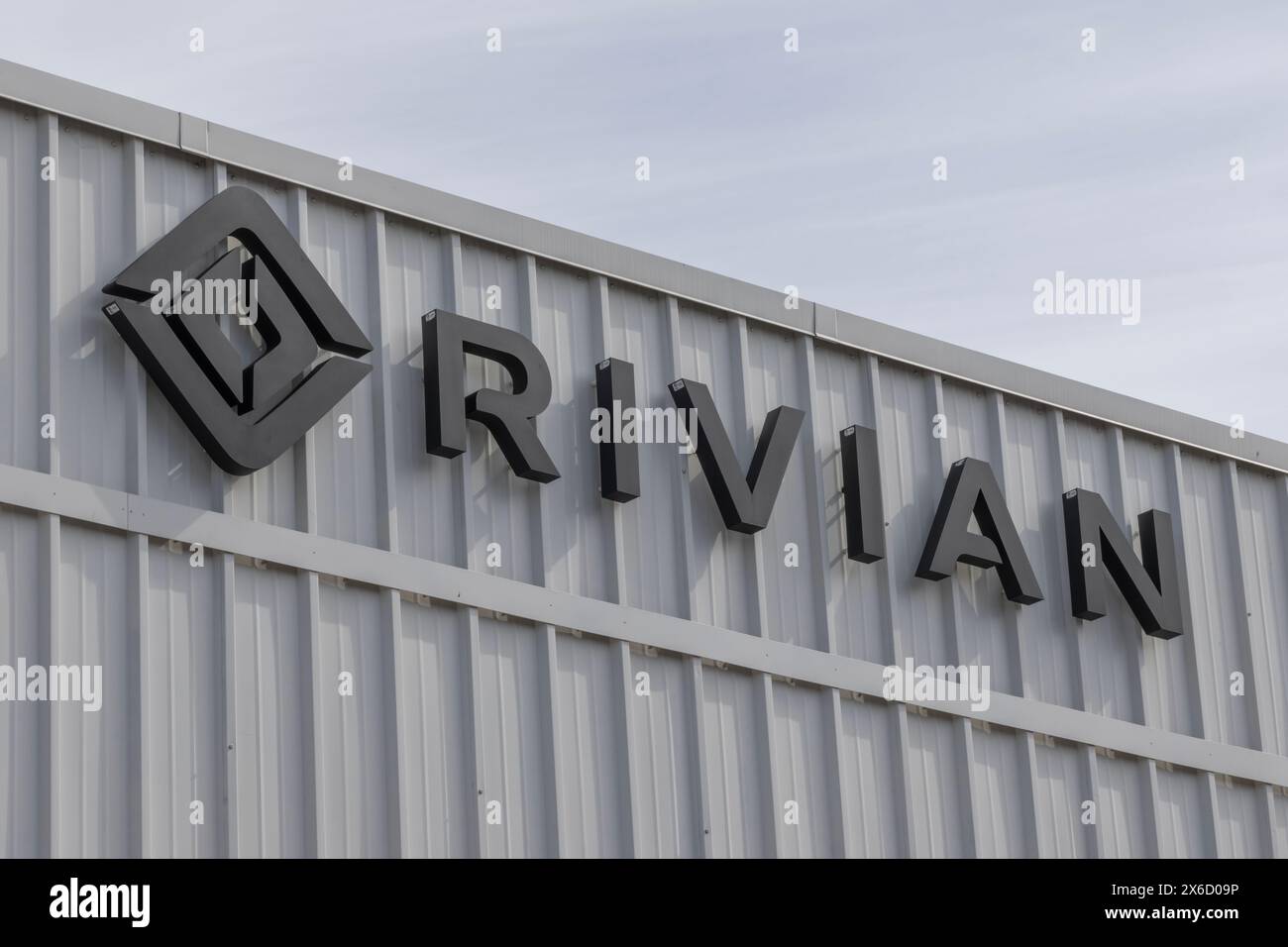 Chicago - May 12, 2024: Rivian Service Center. Rivian manufactures ...
