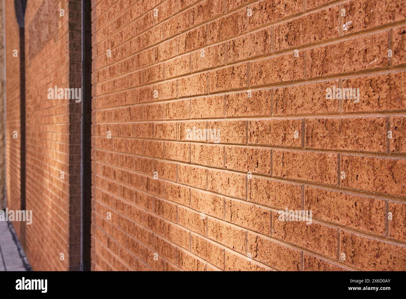Textured Brick Wall Detail in Warm Light, Angled Perspective Stock ...