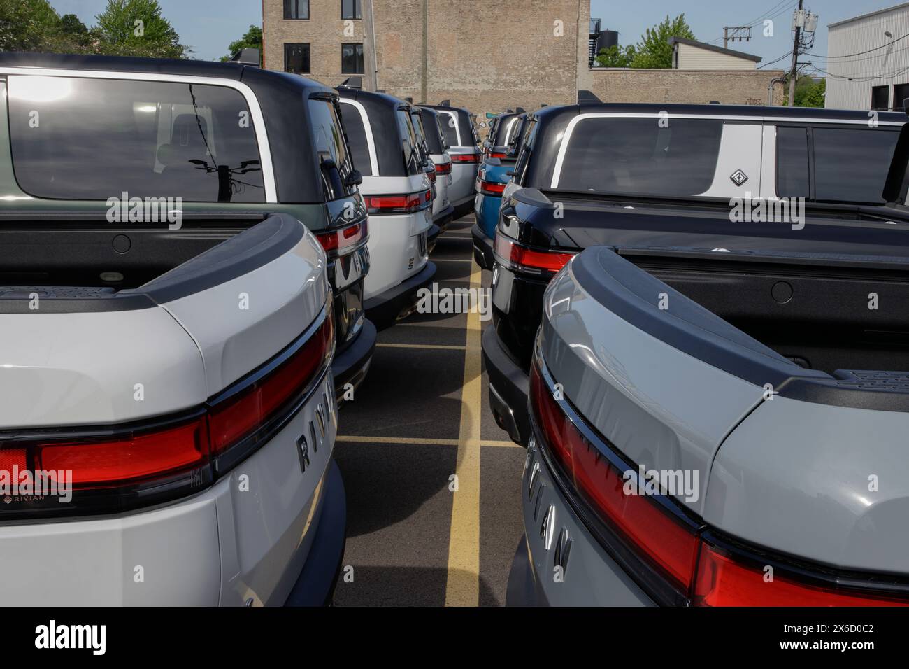 Chicago - May 12, 2024: Rivian R1S SUV and R1T Light Pickup Truck ...