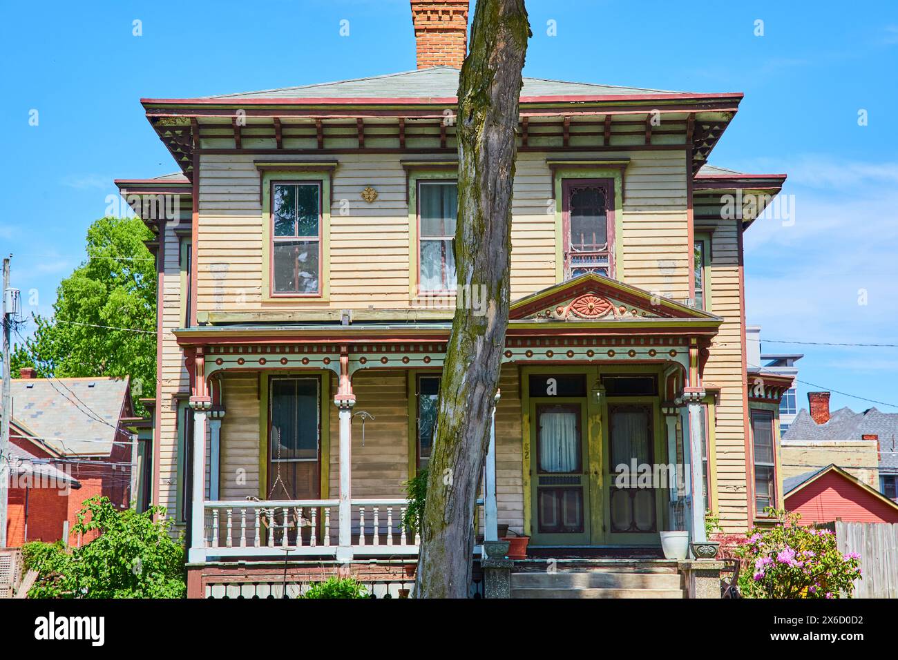 Victorian Home with Ornate Gable and Mature Tree in Suburban Fort Wayne ...