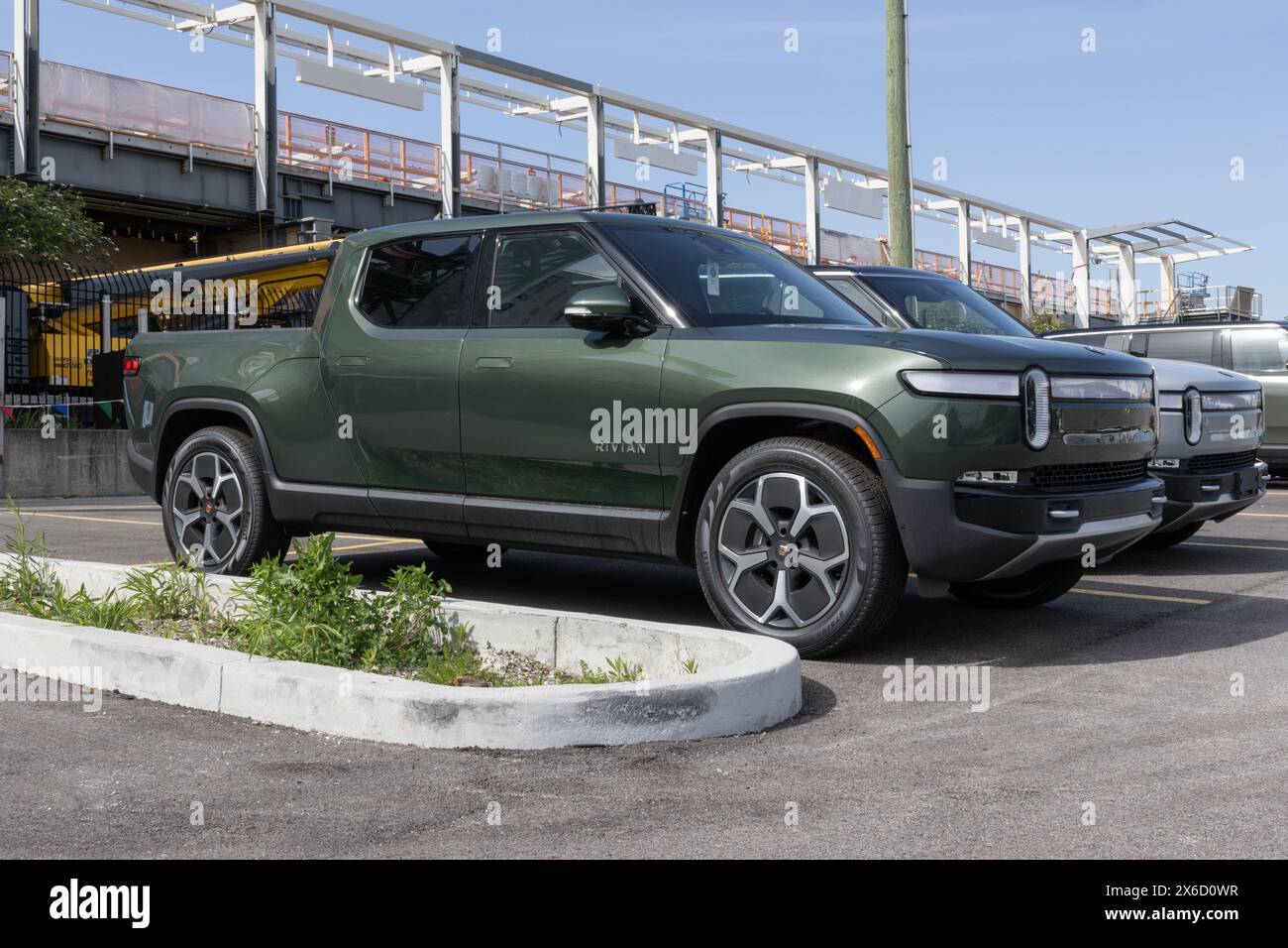 Chicago - May 12, 2024: Rivian R1T pickup truck display. Rivian offers ...