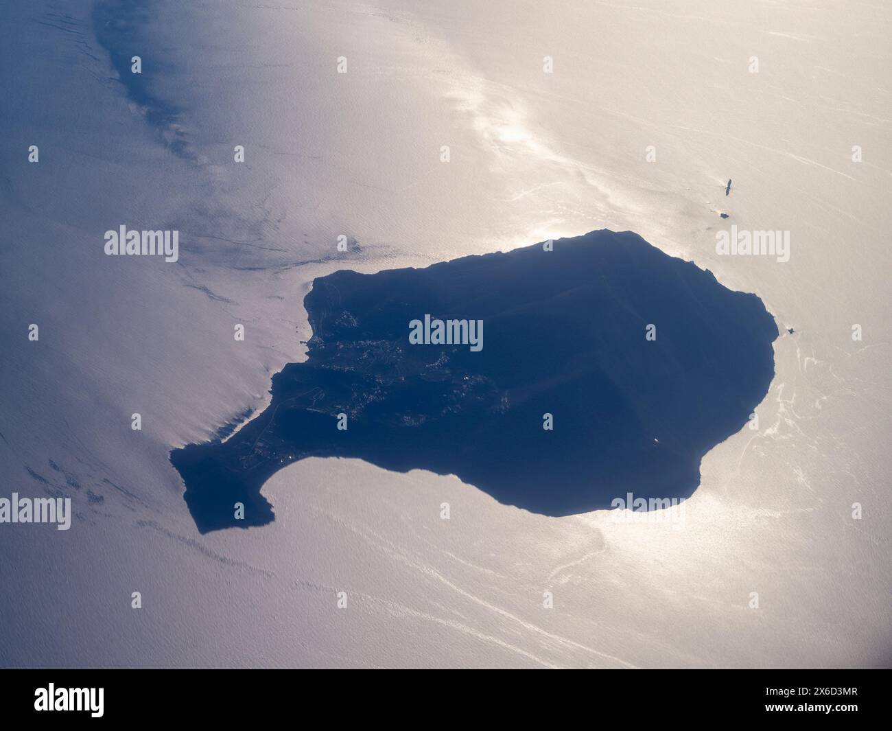 The Filicudi island aerial view from airplane at golden sunset, Aeolian ...