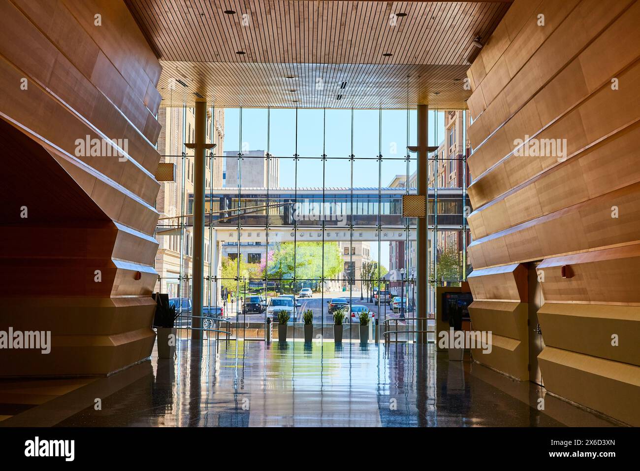 Modern Lobby with Wood Panels, Glass Facade, and Reflective Floor, Eye ...