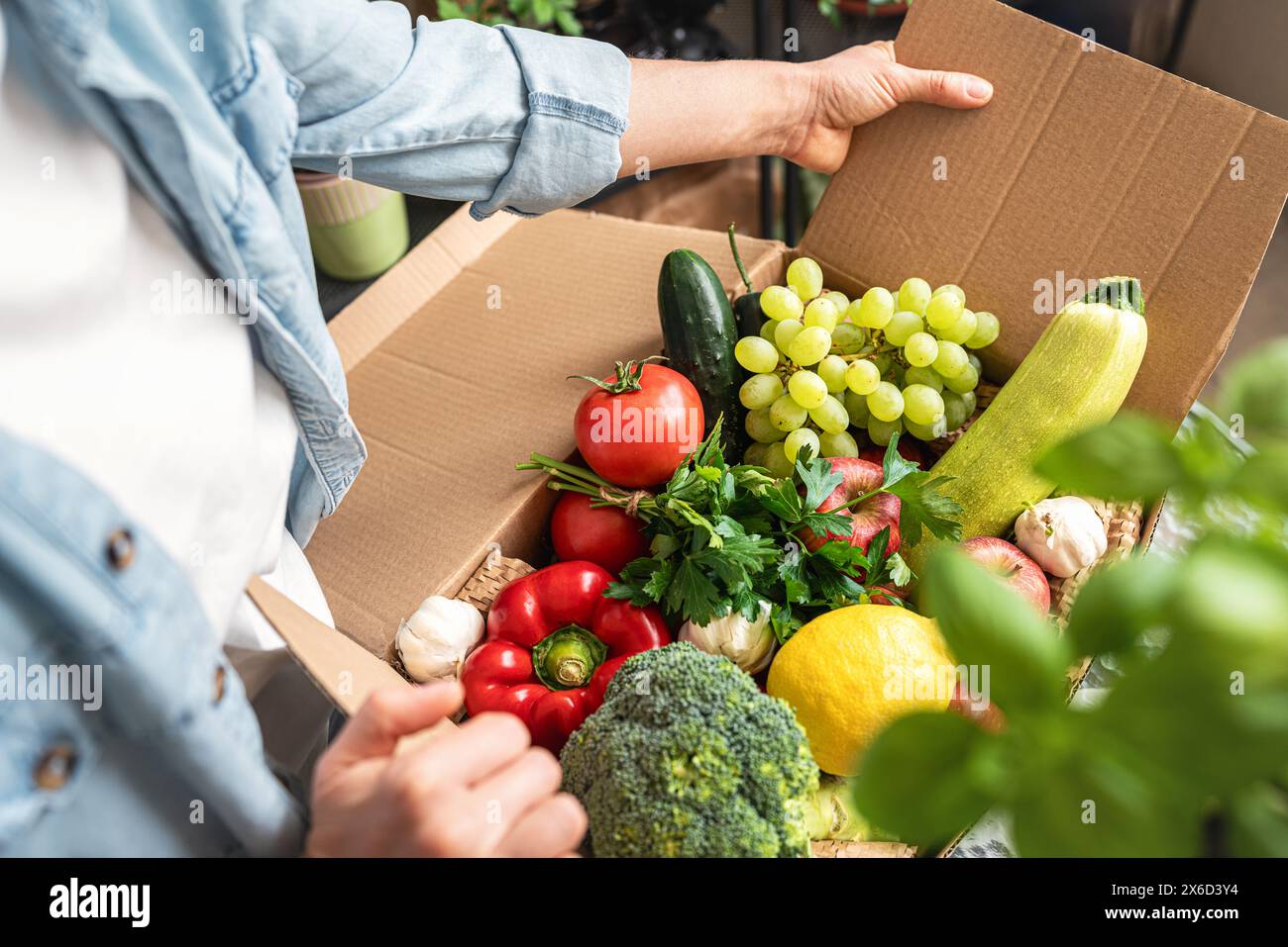 Healthy organic farm grown vegetables and fruits in a delivery ...