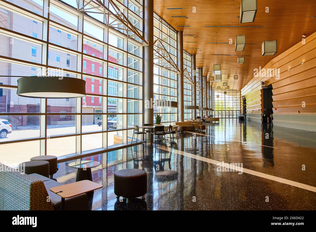 Modern Lobby with Glass Facade and Geometric Lights, Urban View Stock ...