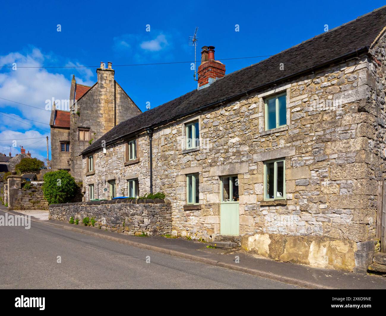 Traditional stone houses in Brassington a village in the Derbyshire ...