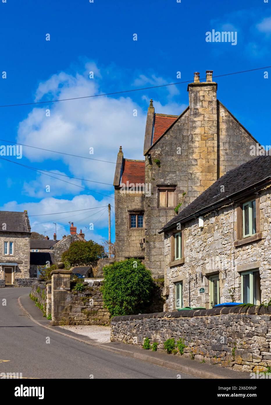 Traditional stone houses in Brassington a village in the Derbyshire ...