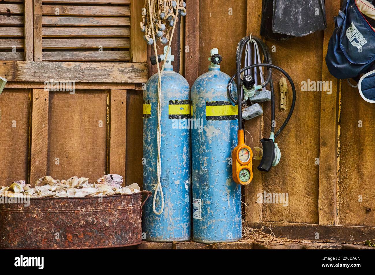 Rustic Scuba Gear Setup with Shells in Workshop Stock Photo - Alamy