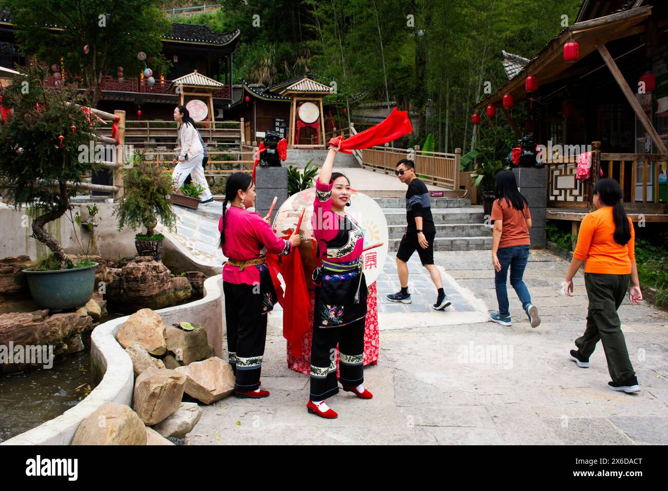 Chinese actress women people playing hit klong or big drum and show ...