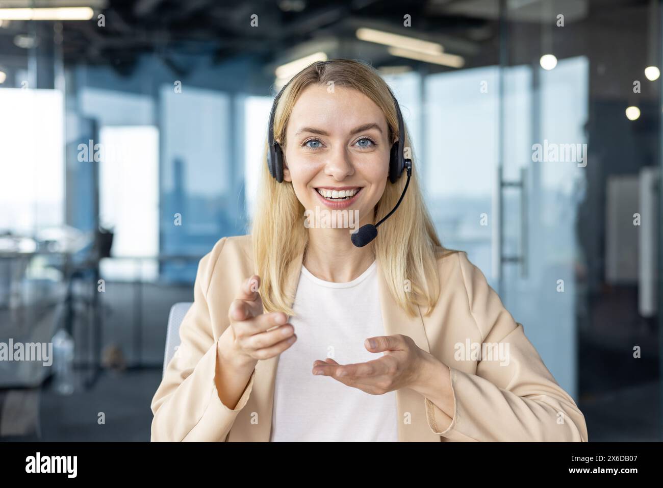 Friendly and engaging professional woman in a modern office setting ...