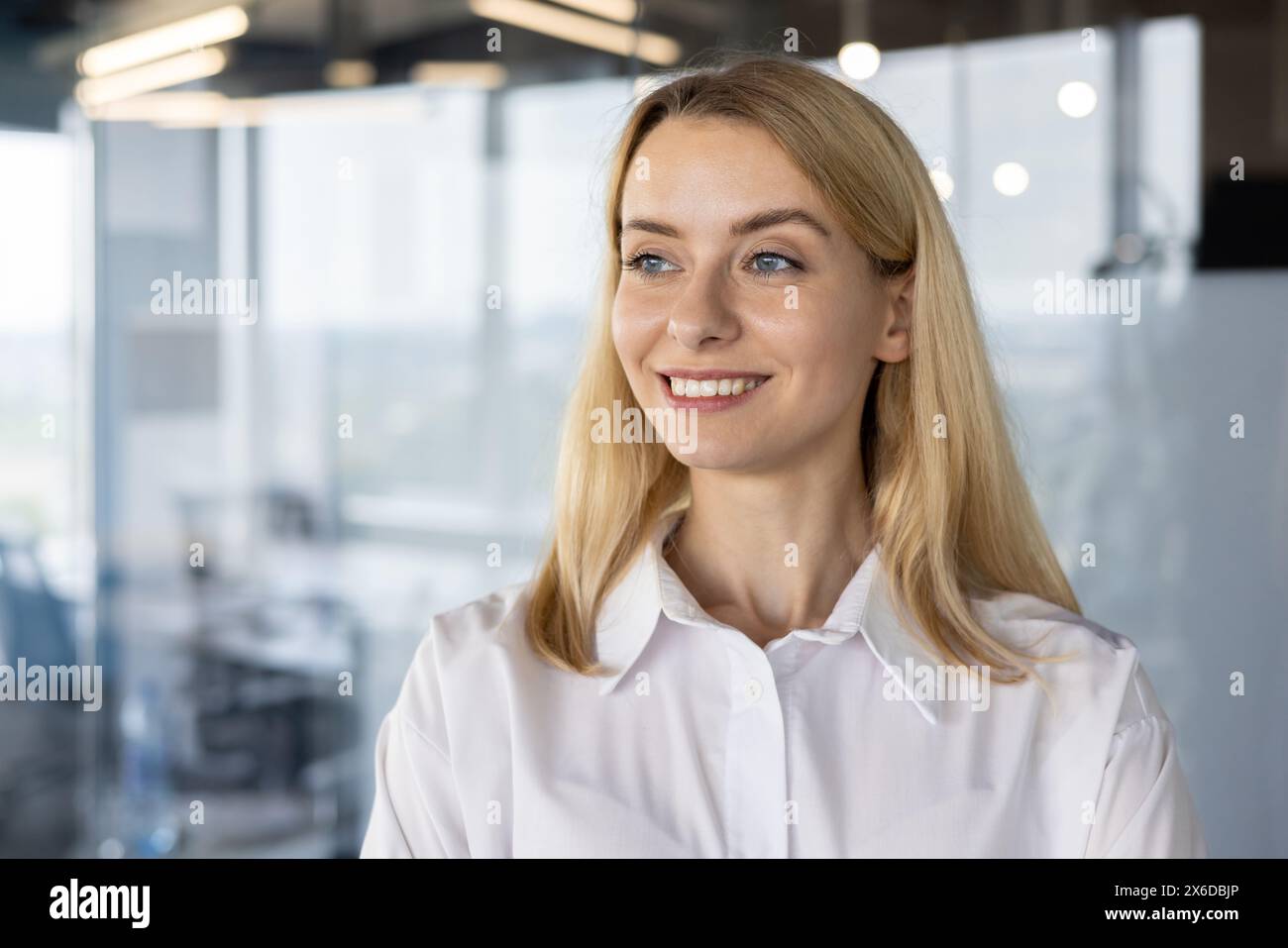 Portrait of a confident female business professional with a sincere ...