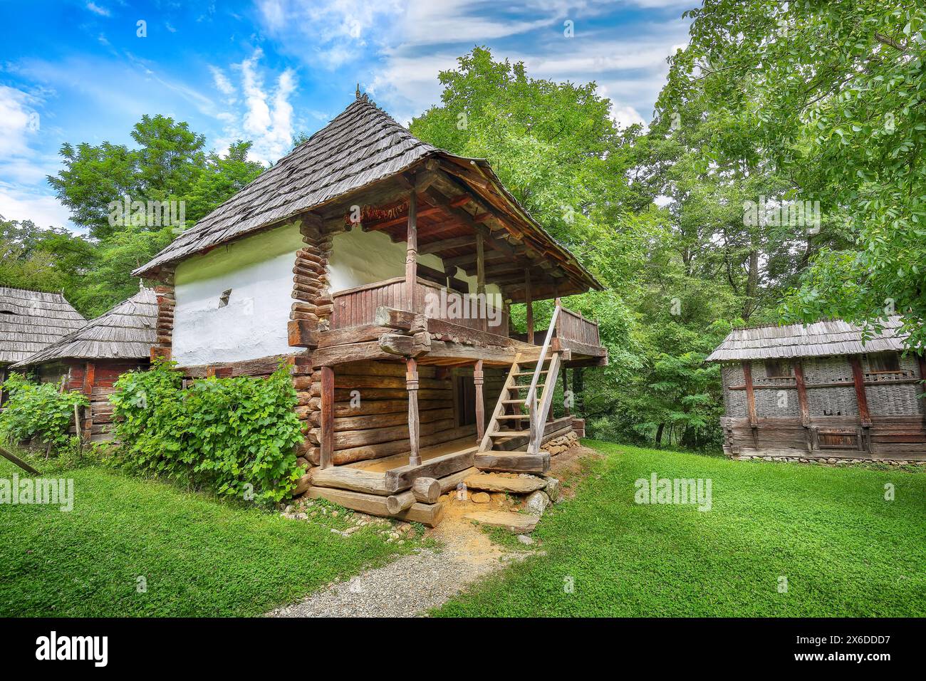 Gorgeous summer scene of traditional romanian peasant houses. Beauty of ...