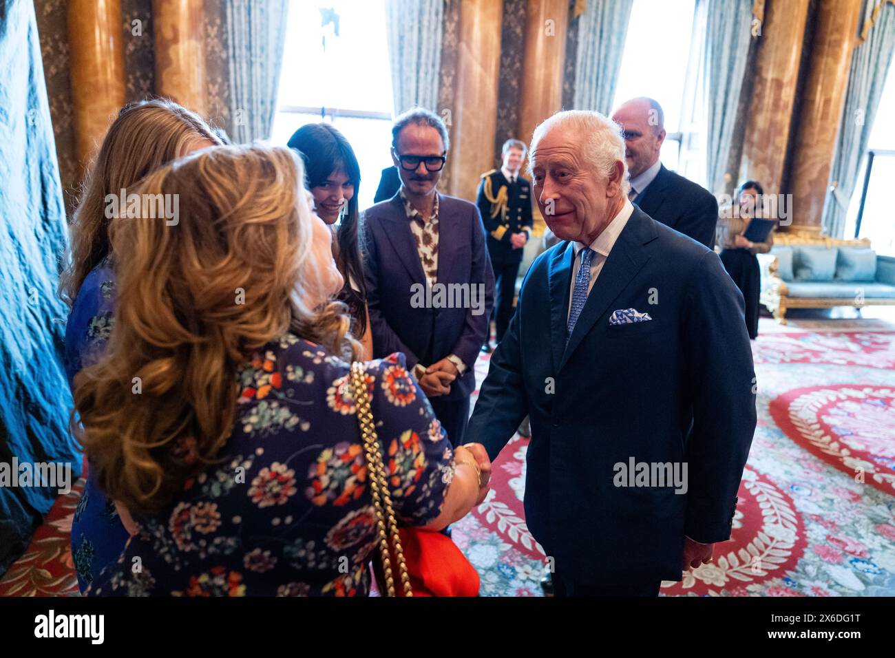 King Charles III greets artist Jonathan Yeo family at the unveiling of ...