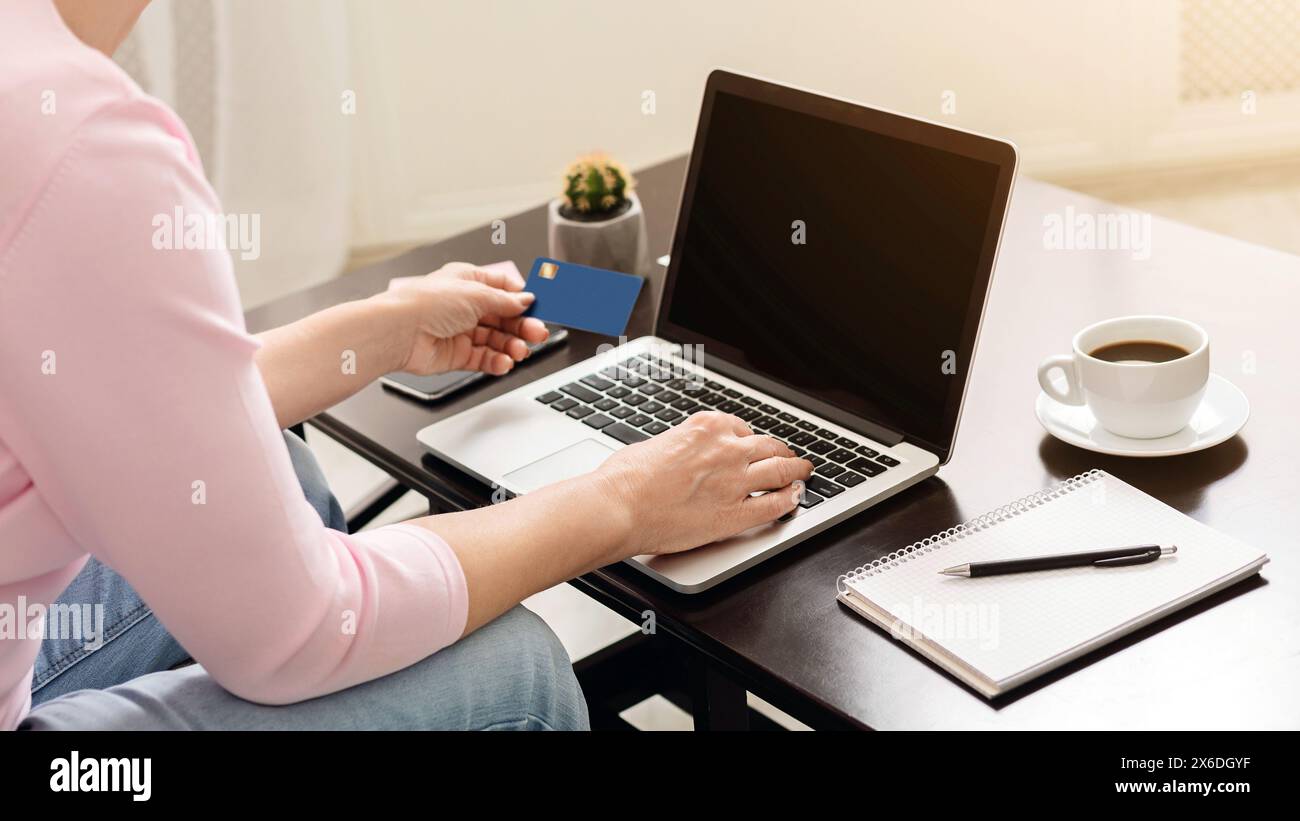 Woman Using Credit Card for Online Shopping on Her Laptop Stock Photo ...