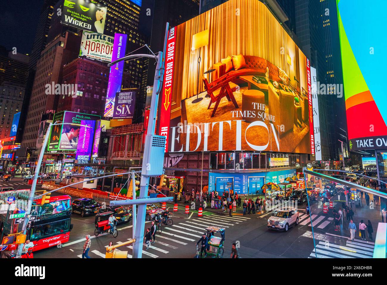 Beautiful night view of Times Square with illuminated neon ...