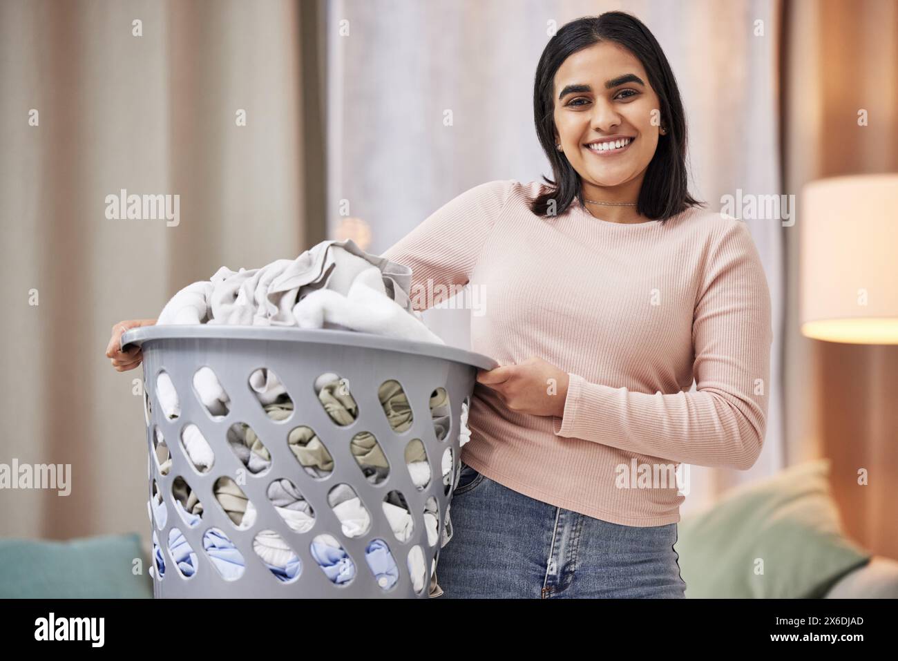 Laundry, basket and portrait of woman in home and happy spring cleaning ...