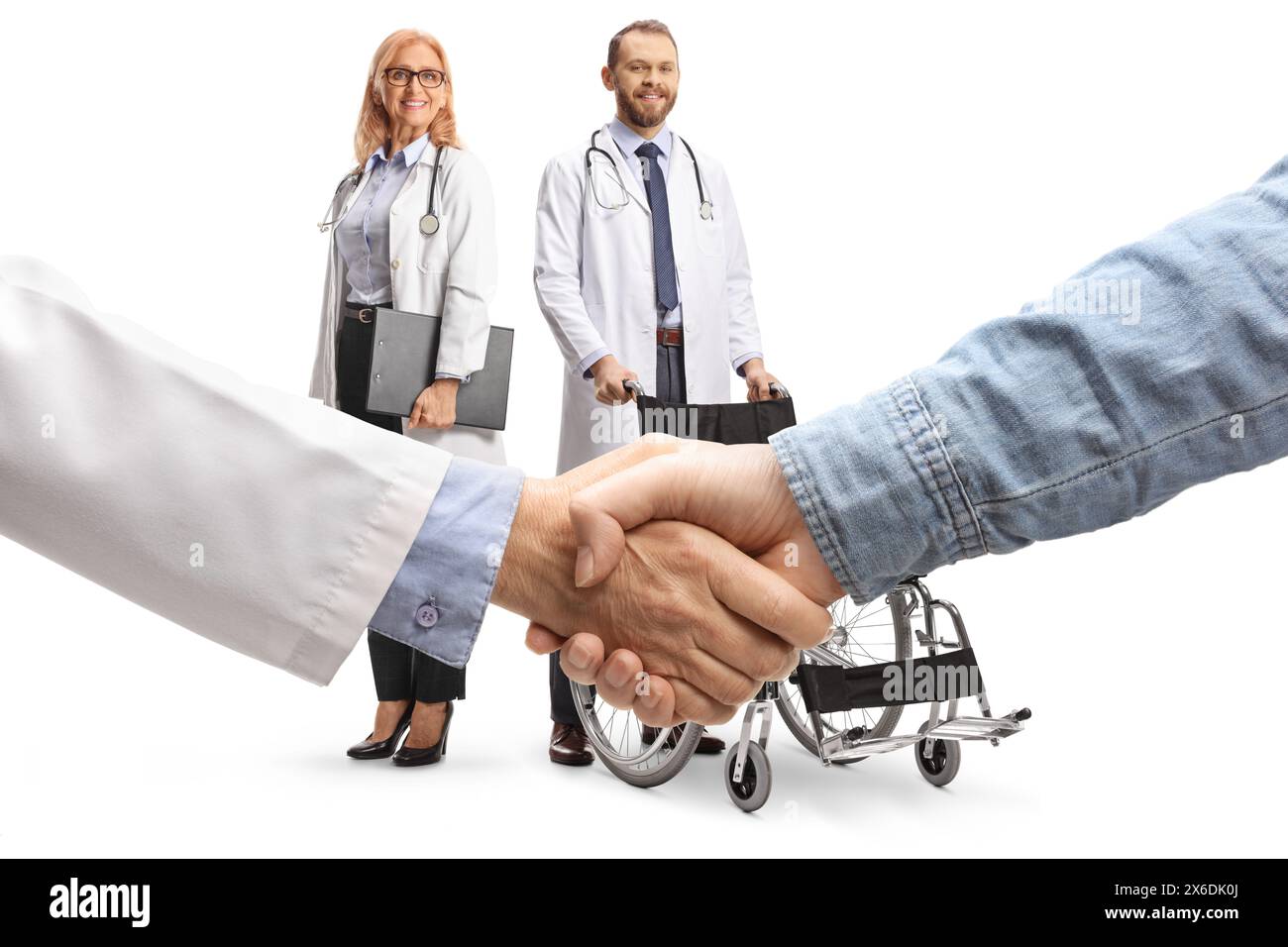 Male and female doctors and a handshake with a patient, trust and ...