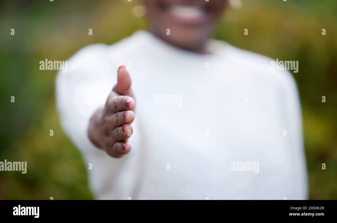 Woman, handshake and greeting gesture outside, welcome and introduction ...
