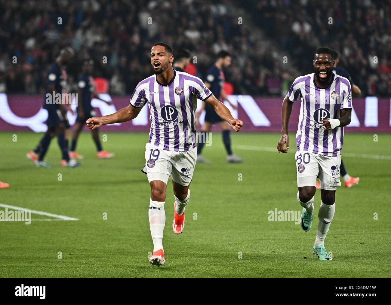PARIS, FRANCE - MAY 12: Frank Magri of Toulouse FC celebrate with Shavy ...