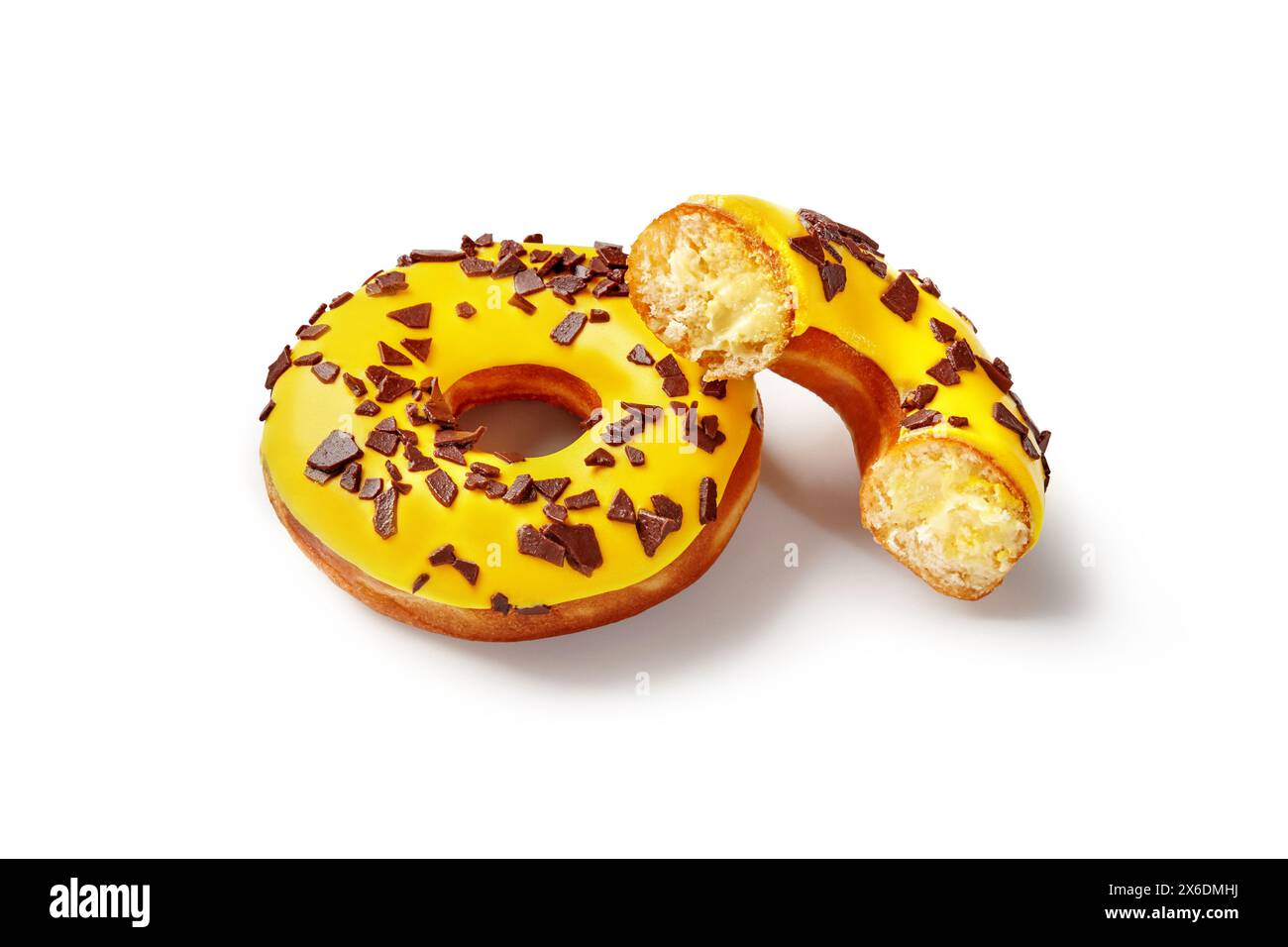 Fluffy donuts with tropic fruit flavored buttercream and yellow icing ...