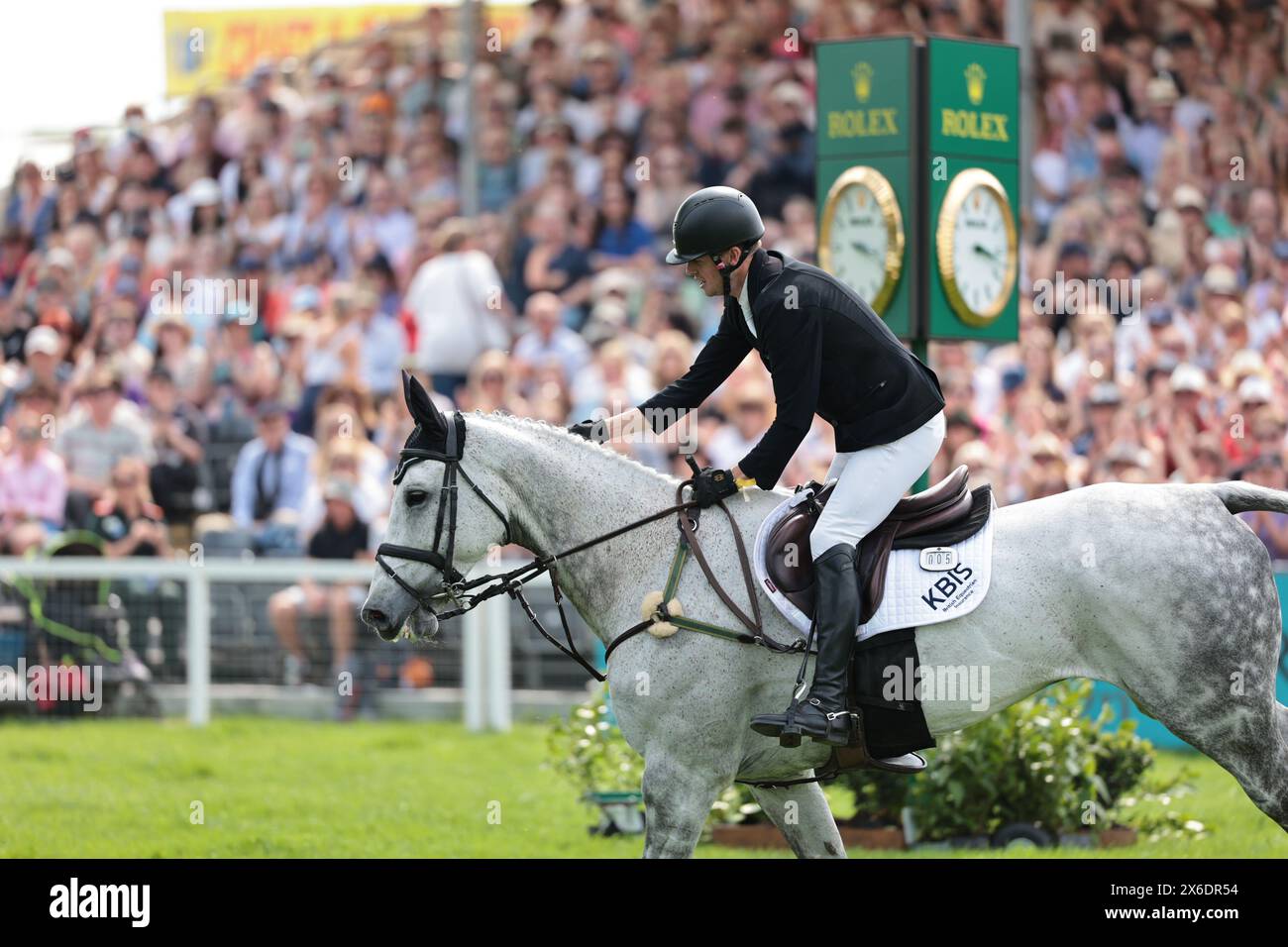 Tom Rowland of Great Britain with Dreamliner during showjumping at ...