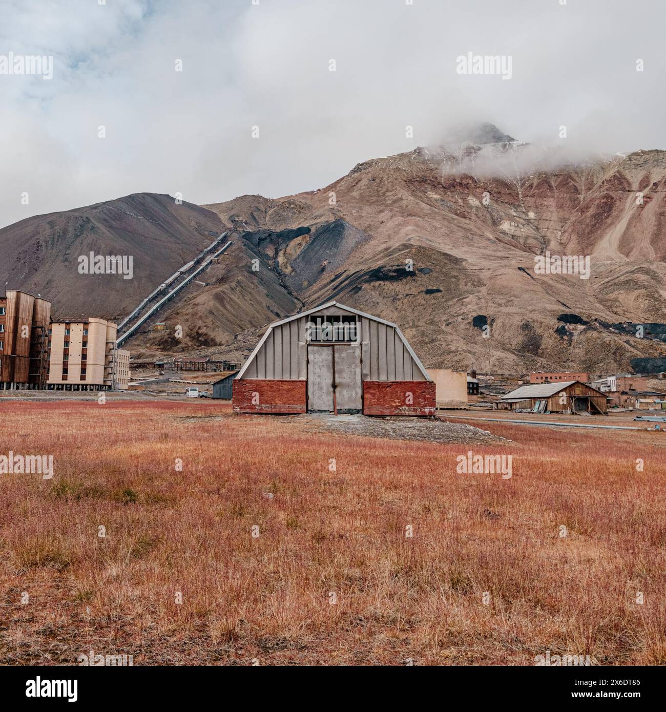 Industrial remnants in the barren landscape of Pyramiden, Svalbard ...