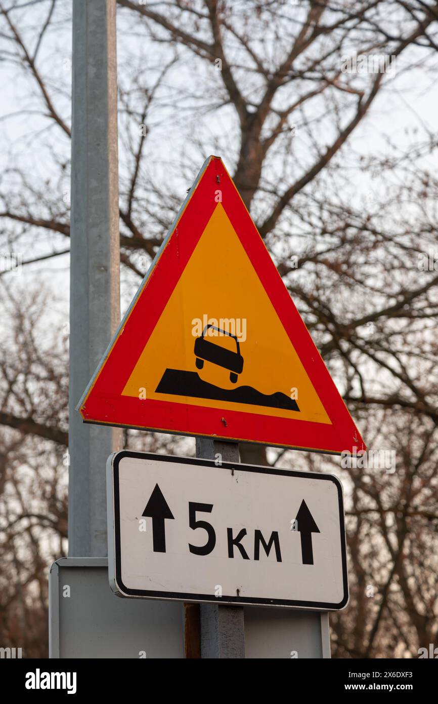road signs. warning road sign dangerous roadside Stock Photo - Alamy