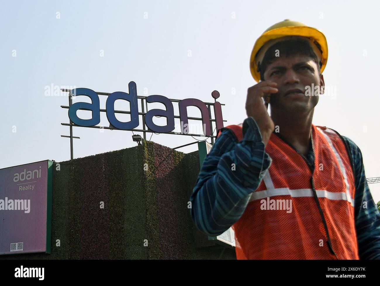 Adani Group Logo Adani Group's Flagship, Utility Firm Seek To Raise