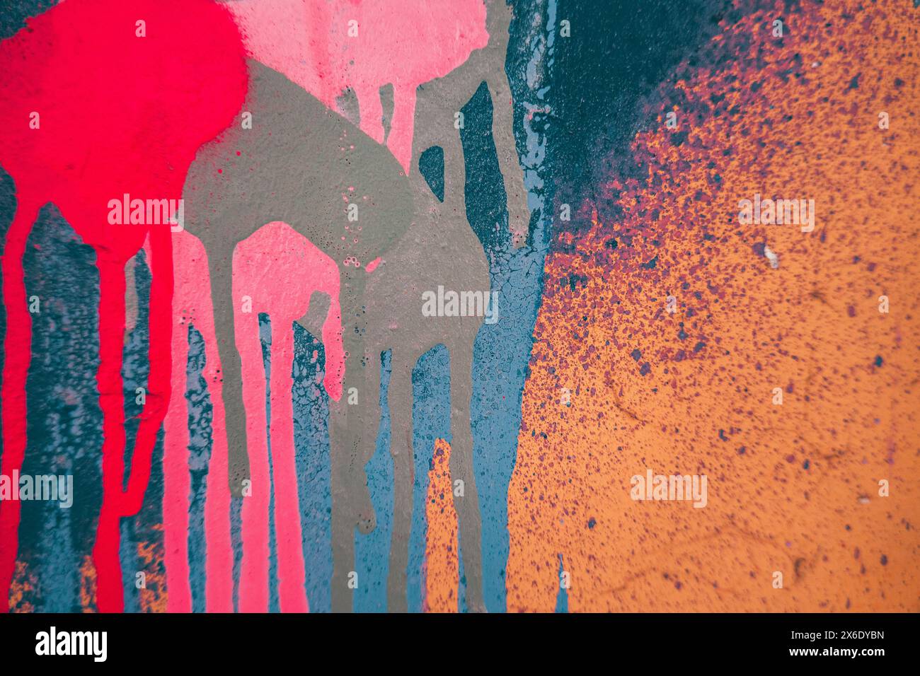 Messy paint strokes and smudges on an old painted wall background ...