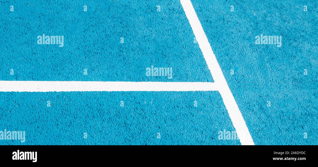 Sport field court background. Light blue rubberized and granulated ...