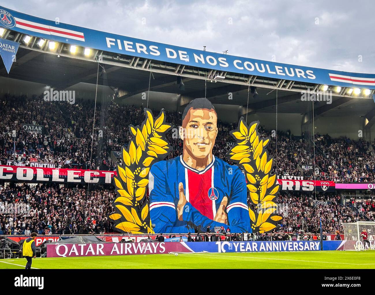 Paris, France. 12th May, 2024. PSG supporters deploy a giant tifo ...