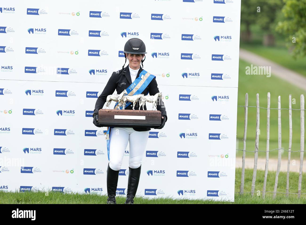 Winner Caroline Powell of New Zealand posing with the trophy after ...