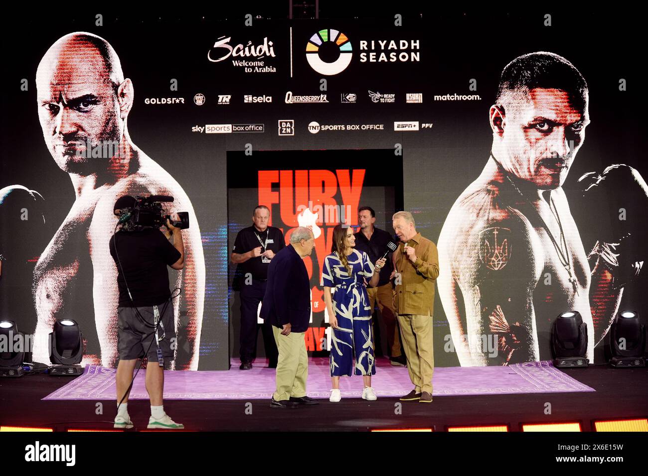 Presenter Ali Drew with promoters Frank Warren (right) and Bob Arum ...
