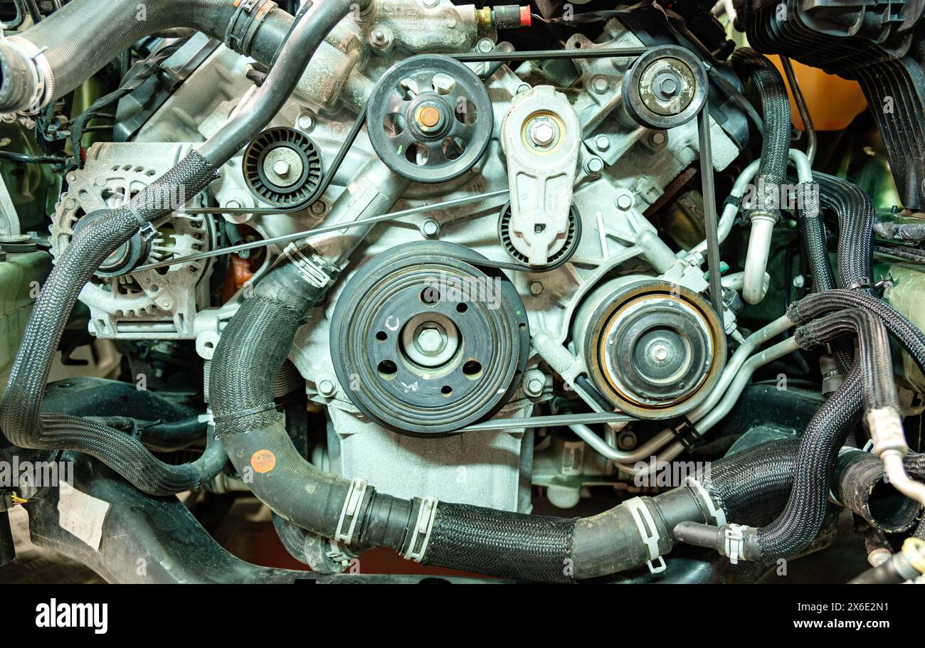 Close-up view of a complex V8 car engine with detailed components and ...