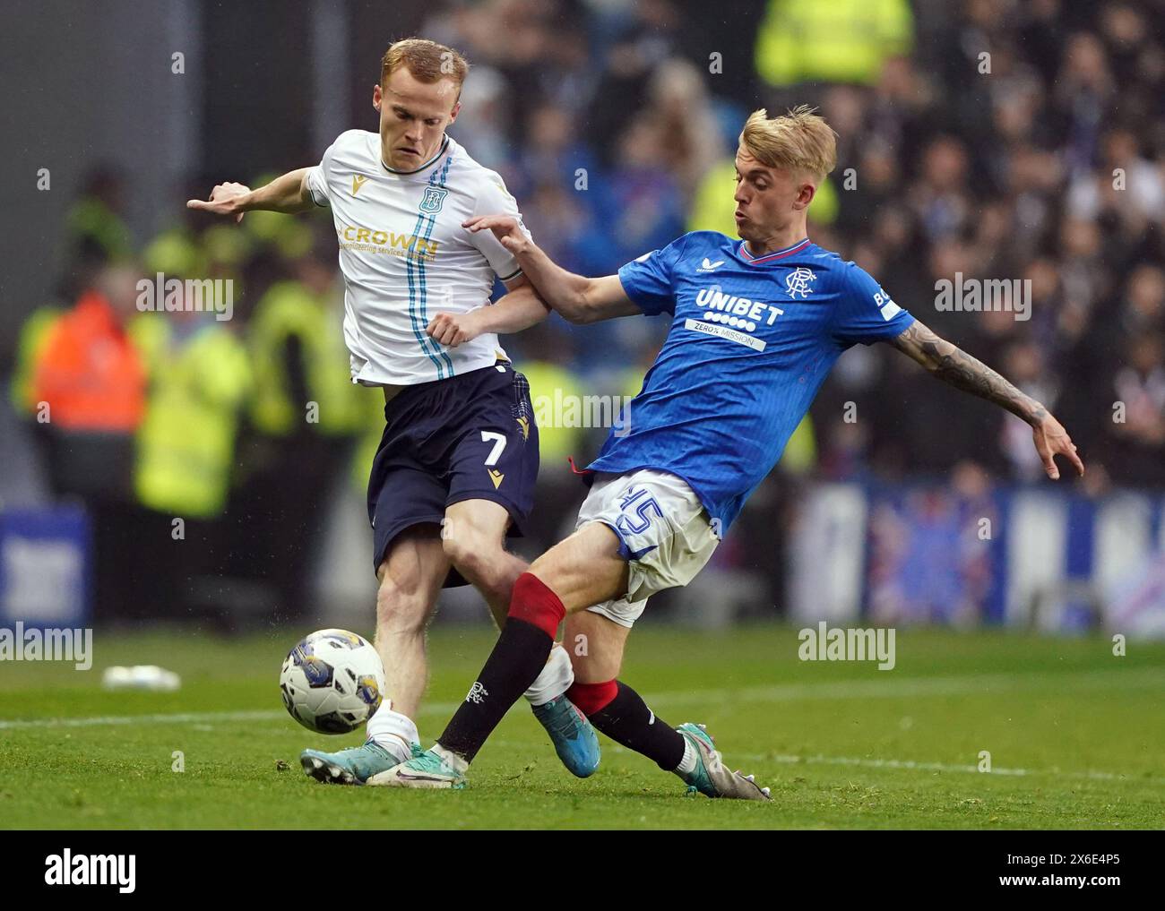 Rangers' Ross McCausland (right) and Dundee's Scott Tiffoney (left ...