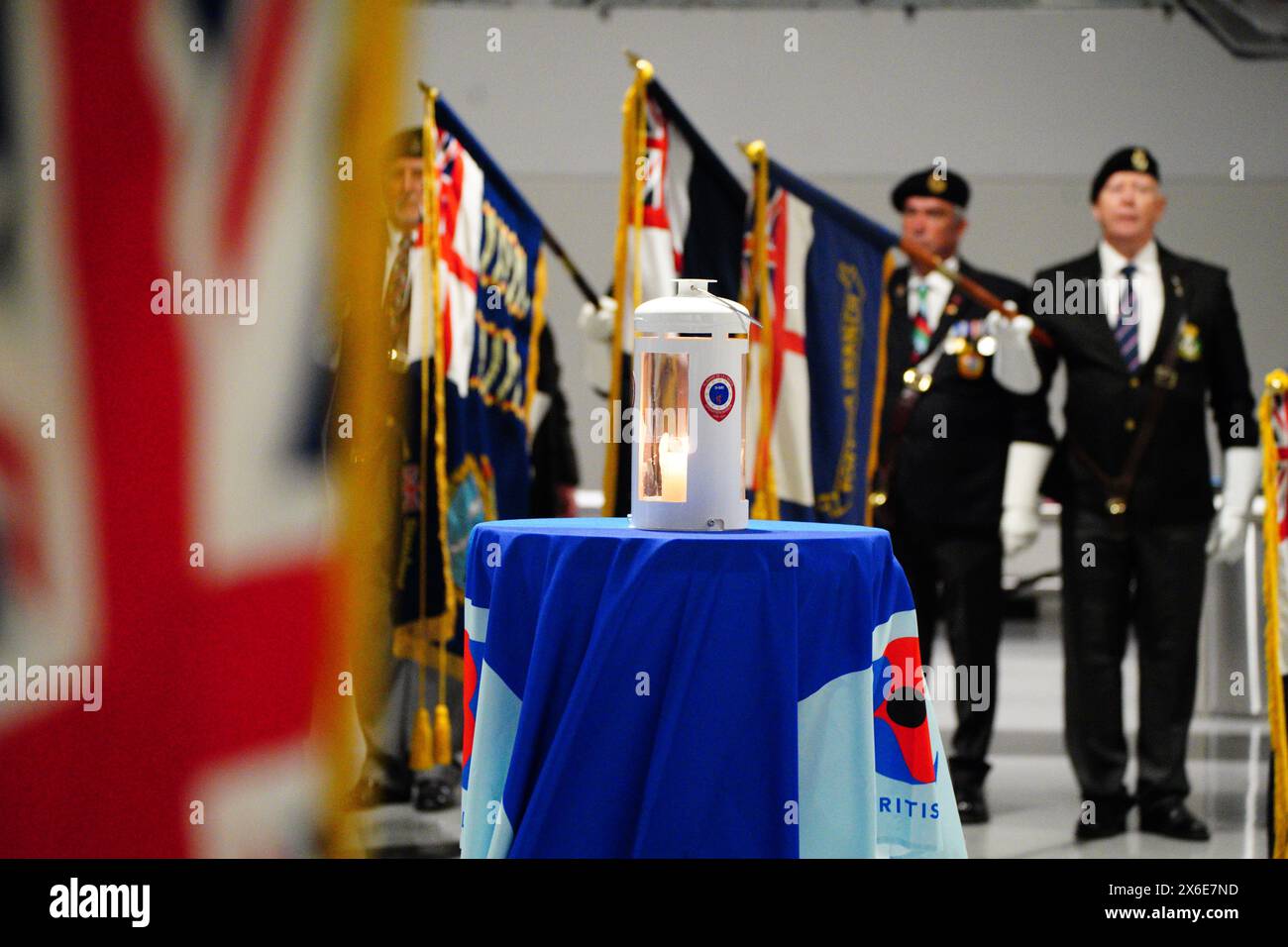 France's Freedom Flame is displayed during a ceremony at Portsmouth ...