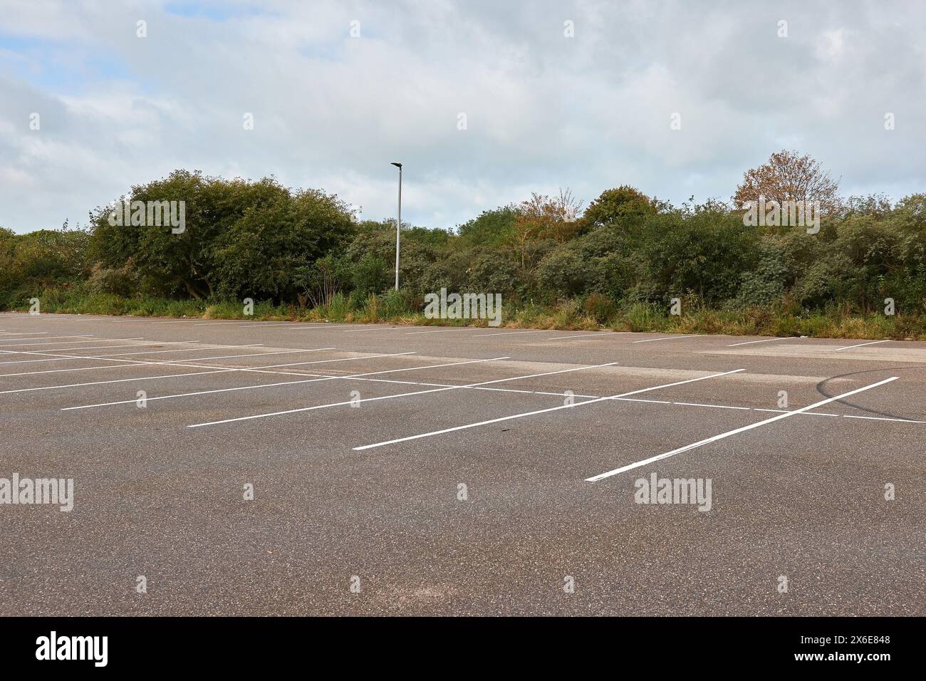 Carpark with empty parking spots Stock Photo - Alamy
