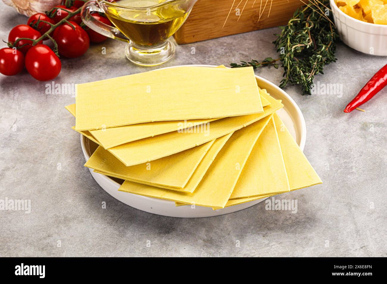 Italian cuisine - dry lasagna sheets for cooking Stock Photo - Alamy