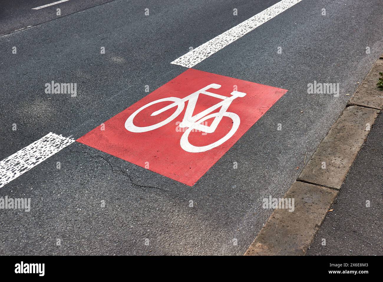 Bicycle lane on a road Stock Photo - Alamy