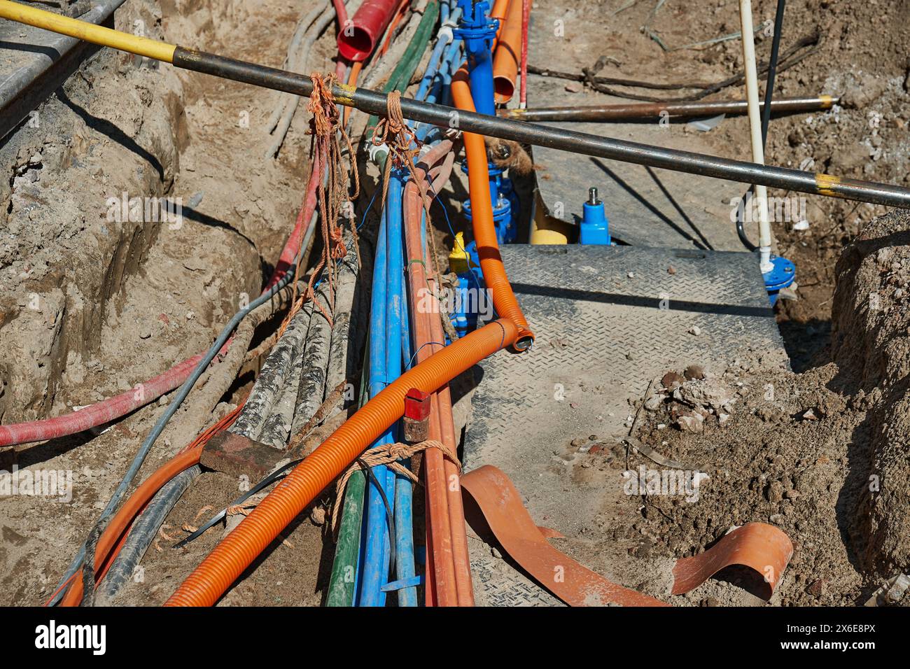 Construction site sign over a utility hole Stock Photo - Alamy